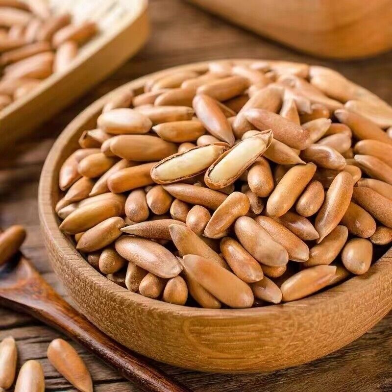 Hand-peeled pine nuts New Brazilian pine nuts Long grain large granula ...